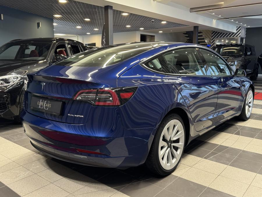 Blue Tesla Model 3 2020 in Riga, with an engine capacity of 0.00 L and mileage of 103 thousand km for 26990 €, photo 5 on AUTOMOTO.COM.LV