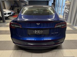 Blue Tesla Model 3 2020 in Riga, with an engine capacity of 0.00 L and mileage of 103 thousand km for 26990 €, photo 6 on AUTOMOTO.COM.LV
