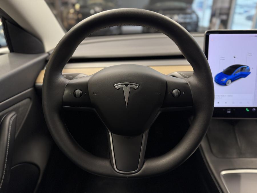 Blue Tesla Model 3 2020 in Riga, with an engine capacity of 0.00 L and mileage of 103 thousand km for 26990 €, photo 28 on AUTOMOTO.COM.LV