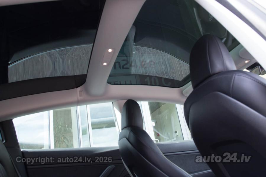 Blue Tesla Model 3 2020 in Tallinn, with an engine capacity of 0.00 L and mileage of 62 thousand km for 24990 €, photo 18 on AUTOMOTO.COM.LV