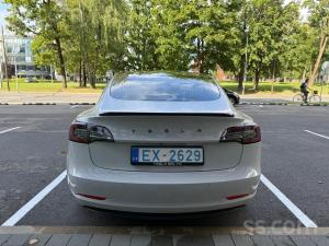 Blue Tesla Model 3 2020 in Riga, with an engine capacity of 0.00 L and mileage of 97 thousand km for 25500 €, photo 9 on AUTOMOTO.COM.LV