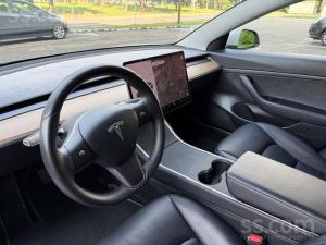 Blue Tesla Model 3 2020 in Riga, with an engine capacity of 0.00 L and mileage of 97 thousand km for 25500 €, photo 15 on AUTOMOTO.COM.LV