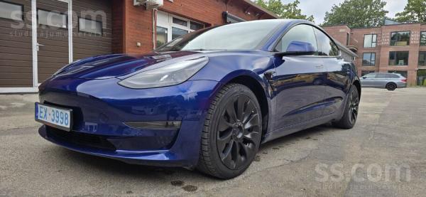 Blue Tesla Model 3 2021 in Riga, with an engine capacity of 0.00 L and mileage of 125 thousand km for 24900 €, photo 2 on AUTOMOTO.COM.LV