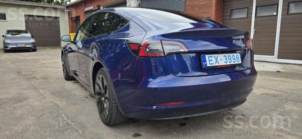 Blue Tesla Model 3 2021 in Riga, with an engine capacity of 0.00 L and mileage of 125 thousand km for 24900 €, photo 7 on AUTOMOTO.COM.LV