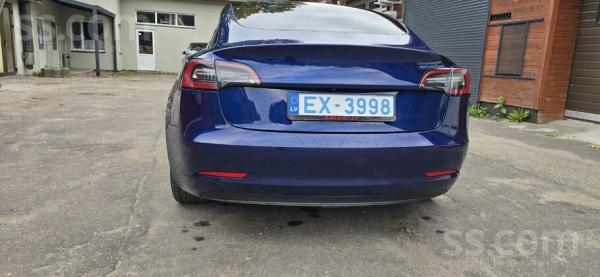 Blue Tesla Model 3 2021 in Riga, with an engine capacity of 0.00 L and mileage of 125 thousand km for 24900 €, photo 8 on AUTOMOTO.COM.LV