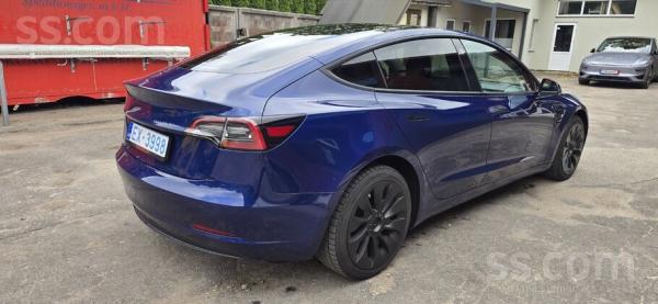Blue Tesla Model 3 2021 in Riga, with an engine capacity of 0.00 L and mileage of 125 thousand km for 24900 €, photo 9 on AUTOMOTO.COM.LV