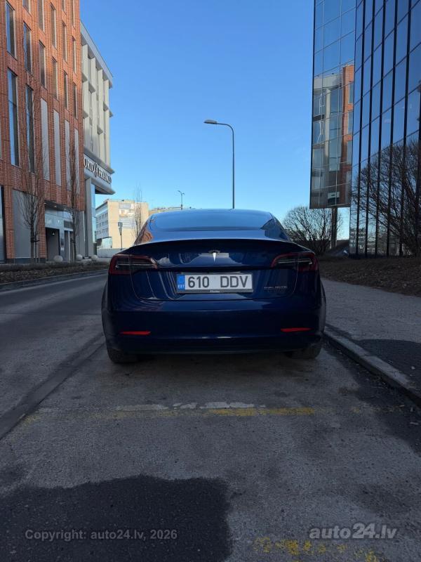 Blue Tesla Model 3 2021 in Tallinn, with an engine capacity of 0.00 L and mileage of 64 thousand km for 32000 €, photo 5 on AUTOMOTO.COM.LV