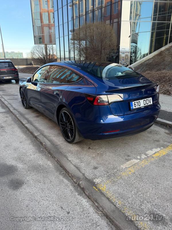 Blue Tesla Model 3 2021 in Tallinn, with an engine capacity of 0.00 L and mileage of 64 thousand km for 32000 €, photo 6 on AUTOMOTO.COM.LV