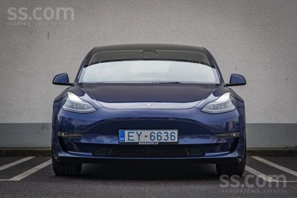 Blue Tesla Model 3 2021 in Riga, with an engine capacity of 0.00 L and mileage of 119 thousand km for 26500 €, photo 2 on AUTOMOTO.COM.LV