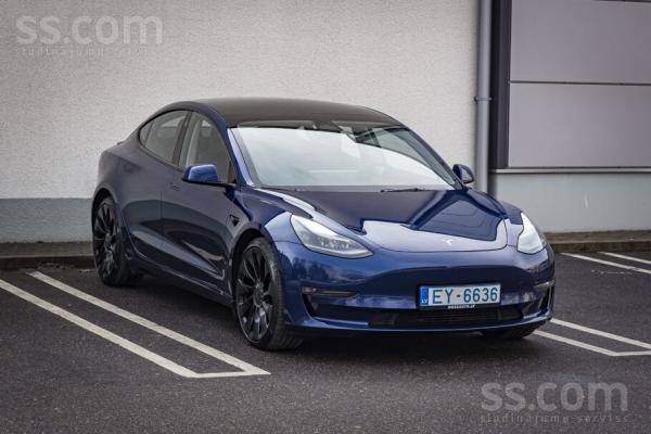 Blue Tesla Model 3 2021 in Riga, with an engine capacity of 0.00 L and mileage of 119 thousand km for 26500 €, photo 3 on AUTOMOTO.COM.LV