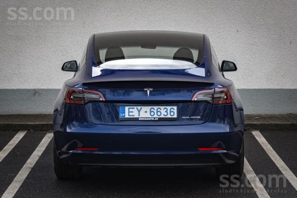 Blue Tesla Model 3 2021 in Riga, with an engine capacity of 0.00 L and mileage of 119 thousand km for 26500 €, photo 5 on AUTOMOTO.COM.LV