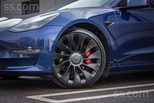Blue Tesla Model 3 2021 in Riga, with an engine capacity of 0.00 L and mileage of 119 thousand km for 26500 €, photo 7 on AUTOMOTO.COM.LV