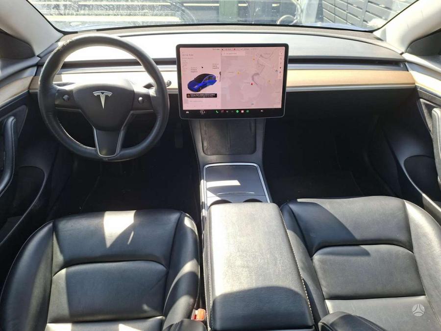 Blue Tesla Model 3 2021 in Panevezys, with an engine capacity of 0.00 L and mileage of 553 thousand km for 8900 €, photo 10 on AUTOMOTO.COM.LV