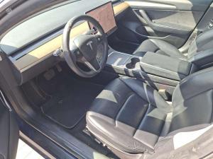 Blue Tesla Model 3 2021 in Panevezys, with an engine capacity of 0.00 L and mileage of 553 thousand km for 8900 €, photo 11 on AUTOMOTO.COM.LV