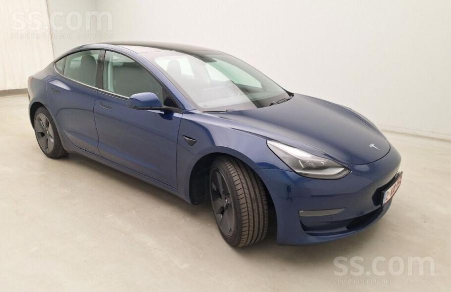 Blue Tesla Model 3 2021 in Riga, with an engine capacity of 0.00 L and mileage of 124 thousand km for 26990 €, photo 3 on AUTOMOTO.COM.LV
