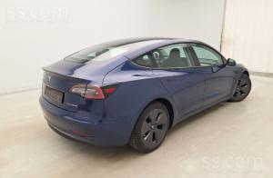 Blue Tesla Model 3 2021 in Riga, with an engine capacity of 0.00 L and mileage of 124 thousand km for 26990 €, photo 4 on AUTOMOTO.COM.LV