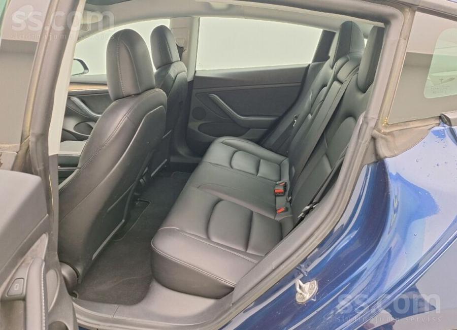 Blue Tesla Model 3 2021 in Riga, with an engine capacity of 0.00 L and mileage of 124 thousand km for 26990 €, photo 7 on AUTOMOTO.COM.LV