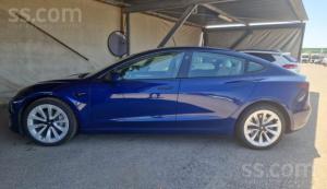 Blue Tesla Model 3 2021 in Riga, with an engine capacity of 0.00 L and mileage of 88 thousand km for 26990 €, photo 3 on AUTOMOTO.COM.LV