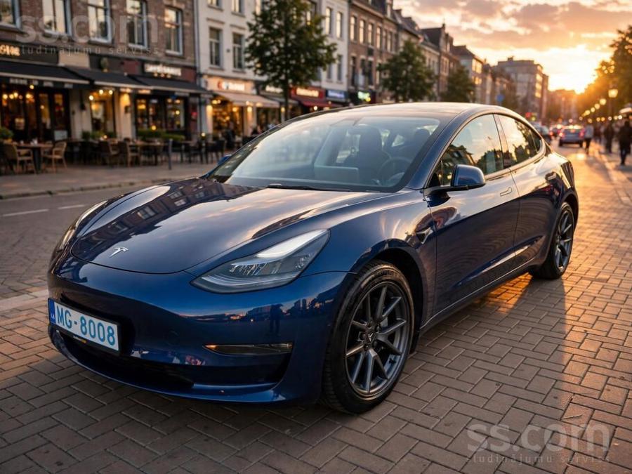 Blue Tesla Model 3 2021 in Riga, with an engine capacity of 0.00 L and mileage of 70 thousand km for 29550 €, photo 1 on AUTOMOTO.COM.LV