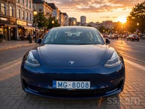 Blue Tesla Model 3 2021 in Riga, with an engine capacity of 0.00 L and mileage of 70 thousand km for 29550 €, photo 3 on AUTOMOTO.COM.LV