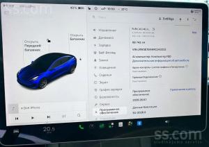 Blue Tesla Model 3 2021 in Riga, with an engine capacity of 0.00 L and mileage of 70 thousand km for 29550 €, photo 11 on AUTOMOTO.COM.LV