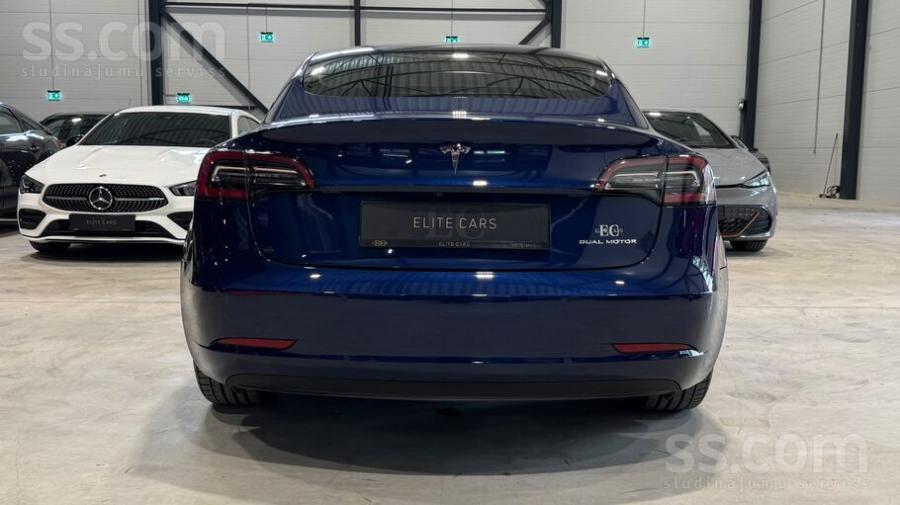 Blue Tesla Model 3 2021 in Riga, with an engine capacity of 0.00 L and mileage of 124 thousand km for 26990 €, photo 5 on AUTOMOTO.COM.LV