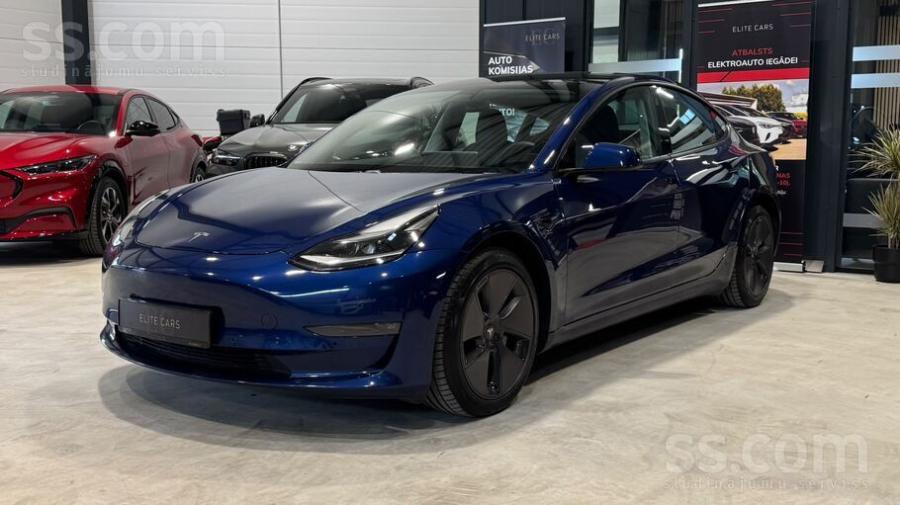 Blue Tesla Model 3 2021 in Riga, with an engine capacity of 0.00 L and mileage of 124 thousand km for 26990 €, photo 6 on AUTOMOTO.COM.LV