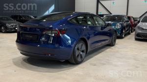 Blue Tesla Model 3 2021 in Riga, with an engine capacity of 0.00 L and mileage of 124 thousand km for 26990 €, photo 7 on AUTOMOTO.COM.LV