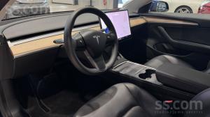 Blue Tesla Model 3 2021 in Riga, with an engine capacity of 0.00 L and mileage of 124 thousand km for 26990 €, photo 10 on AUTOMOTO.COM.LV