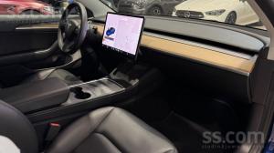 Blue Tesla Model 3 2021 in Riga, with an engine capacity of 0.00 L and mileage of 124 thousand km for 26990 €, photo 14 on AUTOMOTO.COM.LV
