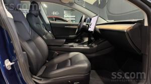 Blue Tesla Model 3 2021 in Riga, with an engine capacity of 0.00 L and mileage of 124 thousand km for 26990 €, photo 15 on AUTOMOTO.COM.LV