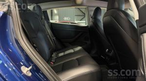 Blue Tesla Model 3 2021 in Riga, with an engine capacity of 0.00 L and mileage of 124 thousand km for 26990 €, photo 18 on AUTOMOTO.COM.LV
