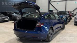 Blue Tesla Model 3 2021 in Riga, with an engine capacity of 0.00 L and mileage of 124 thousand km for 26990 €, photo 19 on AUTOMOTO.COM.LV