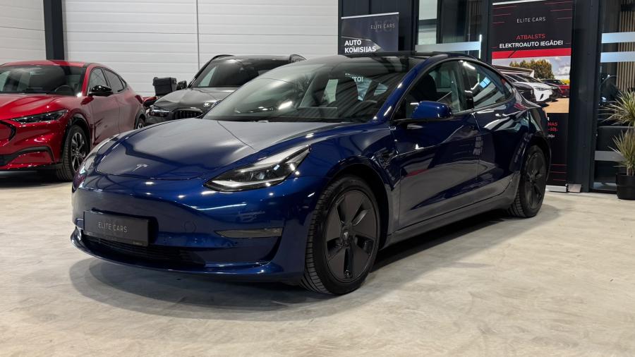 Blue Tesla Model 3 2021 in Riga, with an engine capacity of 0.00 L and mileage of 124 thousand km for 26990 €, photo 5 on AUTOMOTO.COM.LV