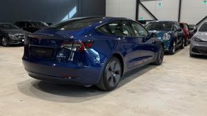 Blue Tesla Model 3 2021 in Riga, with an engine capacity of 0.00 L and mileage of 124 thousand km for 26990 €, photo 6 on AUTOMOTO.COM.LV