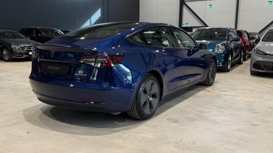Blue Tesla Model 3 2021 in Riga, with an engine capacity of 0.00 L and mileage of 124 thousand km for 26990 €, photo 6 on AUTOMOTO.COM.LV