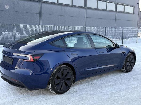 Blue Tesla Model 3 2023 in Kaunas, with an engine capacity of 0.00 L and mileage of 51 thousand km for 14500 €, photo 2 on AUTOMOTO.COM.LV