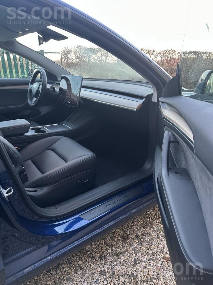 Blue Tesla Model 3 2023 in Riga, with an engine capacity of 0.00 L and mileage of 42 thousand km for 27000 €, photo 8 on AUTOMOTO.COM.LV