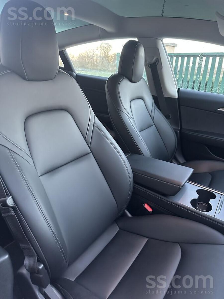Blue Tesla Model 3 2023 in Riga, with an engine capacity of 0.00 L and mileage of 42 thousand km for 27000 €, photo 9 on AUTOMOTO.COM.LV