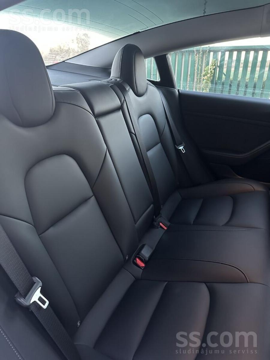 Blue Tesla Model 3 2023 in Riga, with an engine capacity of 0.00 L and mileage of 42 thousand km for 27000 €, photo 11 on AUTOMOTO.COM.LV