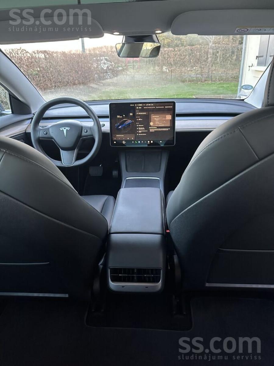 Blue Tesla Model 3 2023 in Riga, with an engine capacity of 0.00 L and mileage of 42 thousand km for 27000 €, photo 12 on AUTOMOTO.COM.LV