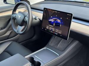 Blue Tesla Model 3 2023 in Vilnius, with an engine capacity of 0.00 L and mileage of 66 thousand km for 30000 €, photo 14 on AUTOMOTO.COM.LV