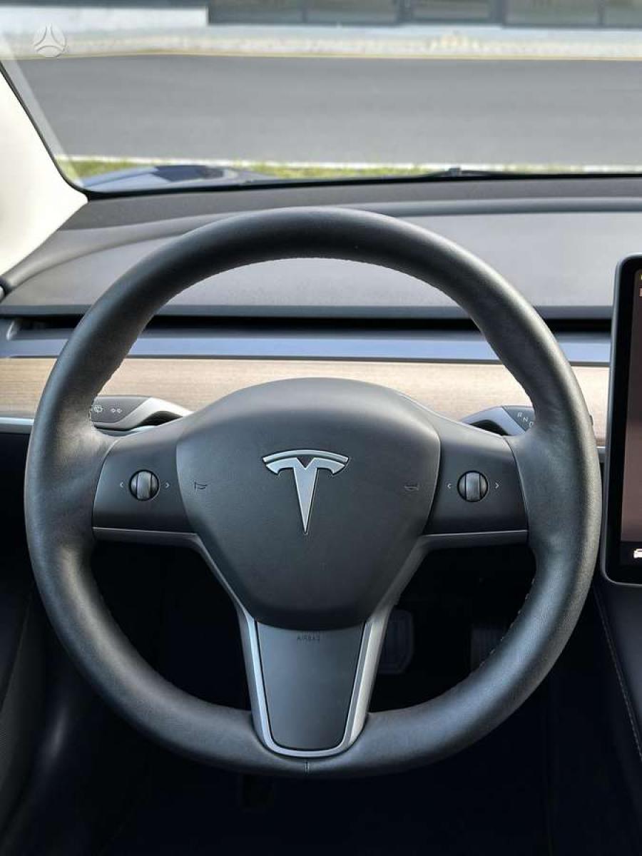 Blue Tesla Model 3 2023 in Vilnius, with an engine capacity of 0.00 L and mileage of 66 thousand km for 30000 €, photo 15 on AUTOMOTO.COM.LV