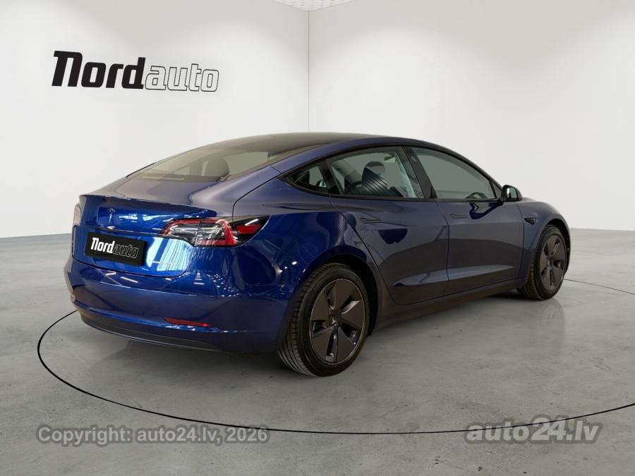 Blue Tesla Model 3 2023 in Tallinn, with an engine capacity of 0.00 L and mileage of 74 thousand km for 32900 €, photo 5 on AUTOMOTO.COM.LV