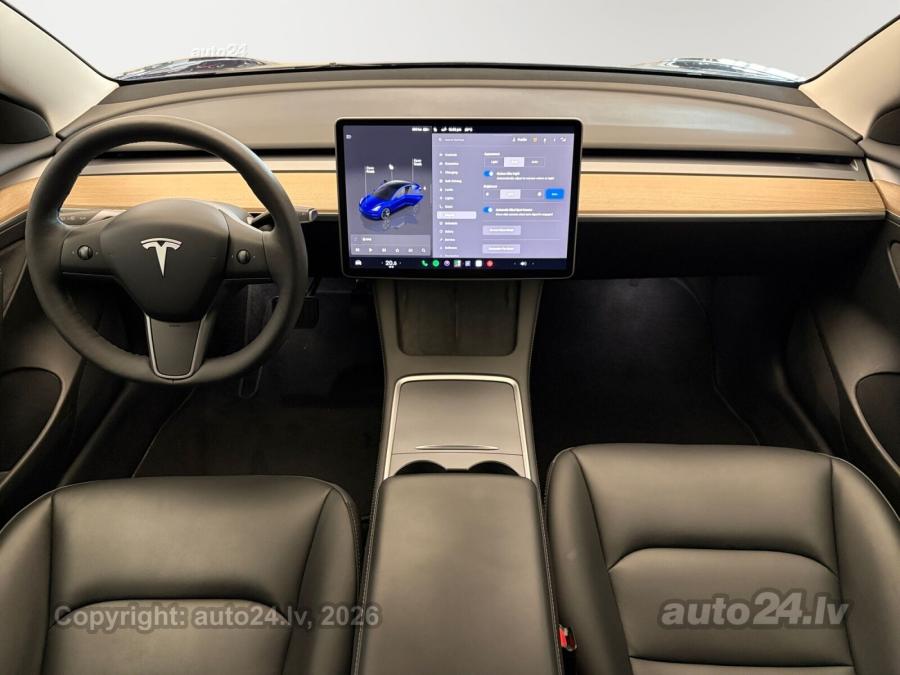 Blue Tesla Model 3 2023 in Tallinn, with an engine capacity of 0.00 L and mileage of 74 thousand km for 32900 €, photo 14 on AUTOMOTO.COM.LV