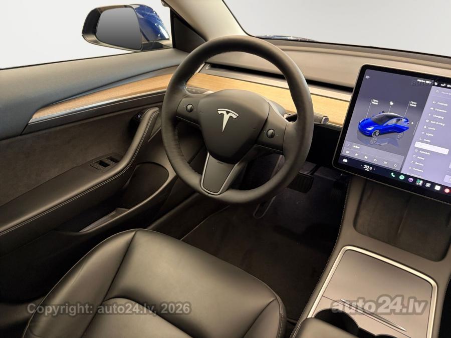 Blue Tesla Model 3 2023 in Tallinn, with an engine capacity of 0.00 L and mileage of 74 thousand km for 32900 €, photo 17 on AUTOMOTO.COM.LV