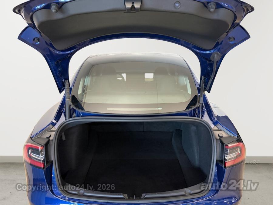 Blue Tesla Model 3 2023 in Tallinn, with an engine capacity of 0.00 L and mileage of 74 thousand km for 32900 €, photo 22 on AUTOMOTO.COM.LV
