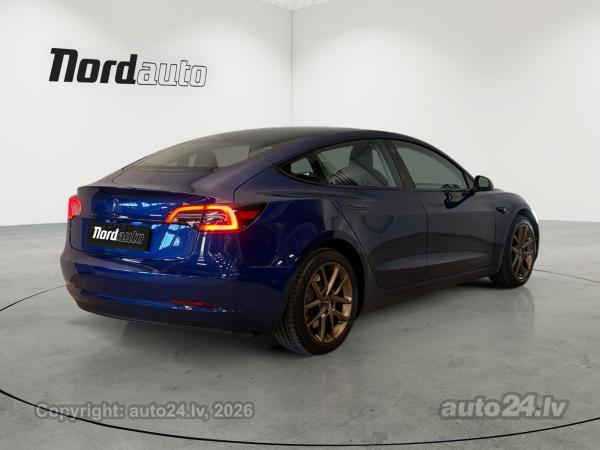 Blue Tesla Model 3 2023 in Tallinn, with an engine capacity of 0.00 L and mileage of 75 thousand km for 32900 €, photo 3 on AUTOMOTO.COM.LV