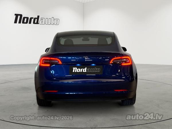 Blue Tesla Model 3 2023 in Tallinn, with an engine capacity of 0.00 L and mileage of 75 thousand km for 32900 €, photo 5 on AUTOMOTO.COM.LV