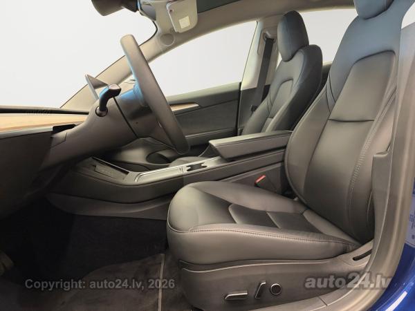 Blue Tesla Model 3 2023 in Tallinn, with an engine capacity of 0.00 L and mileage of 75 thousand km for 32900 €, photo 6 on AUTOMOTO.COM.LV